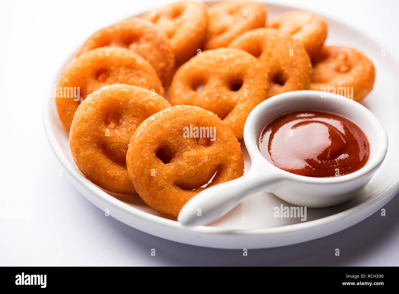 Crunchy potato smiling face snacks hi-res stock photography and images ...