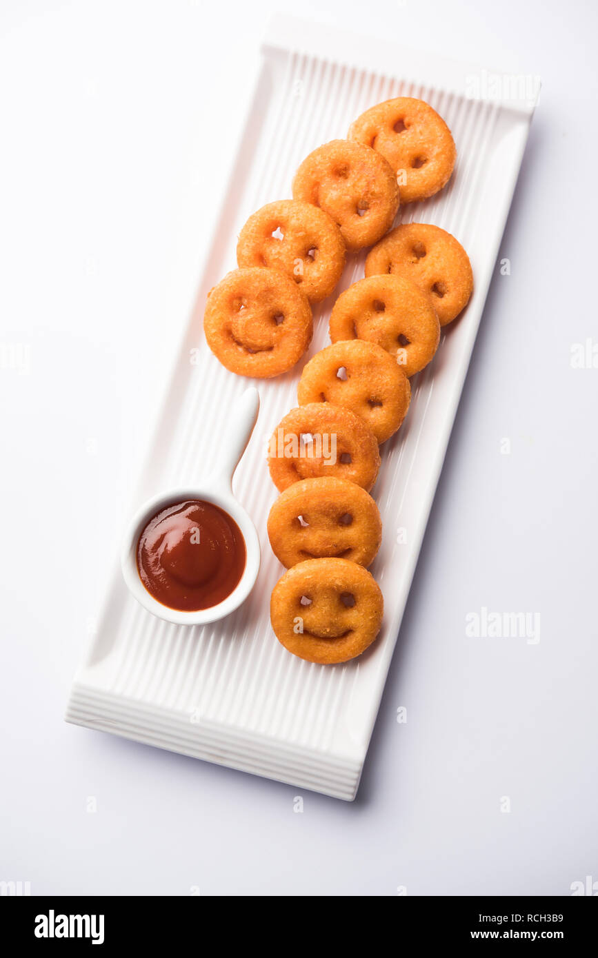 Crunchy potato smiling face snacks hi-res stock photography and images ...