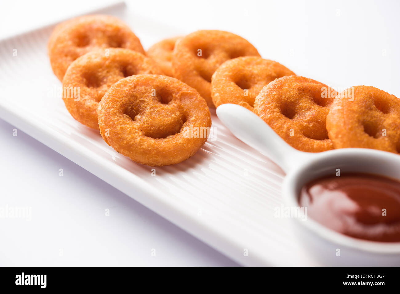 Crunchy potato smiling face snacks hi-res stock photography and images ...