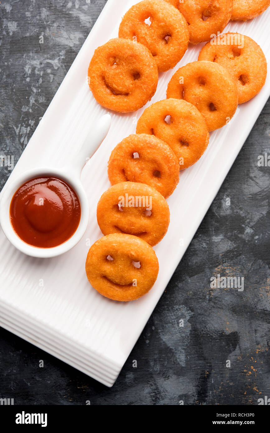 Crunchy potato smiling face snacks hi-res stock photography and images ...