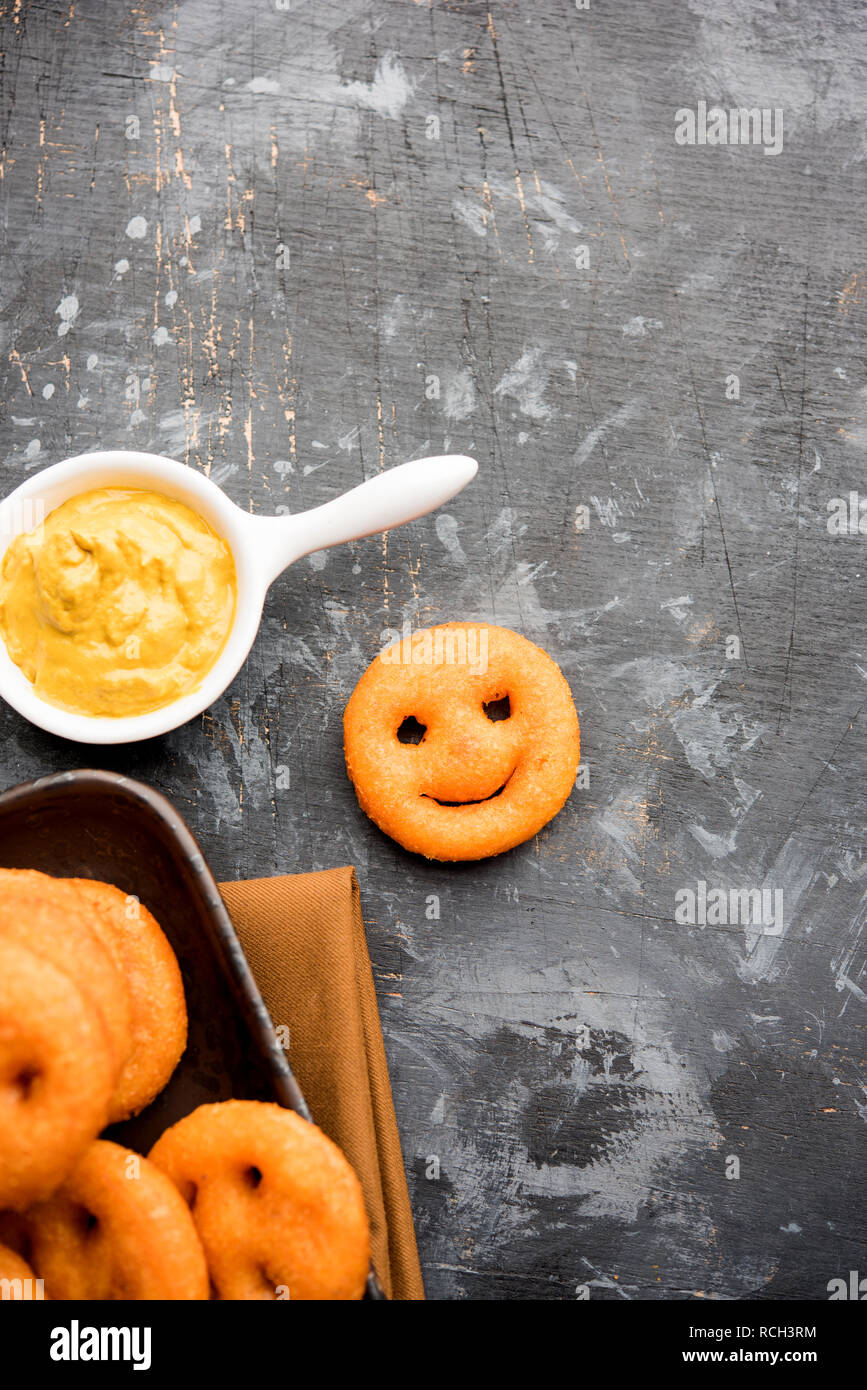Crunchy potato smiling face snacks hi-res stock photography and images ...