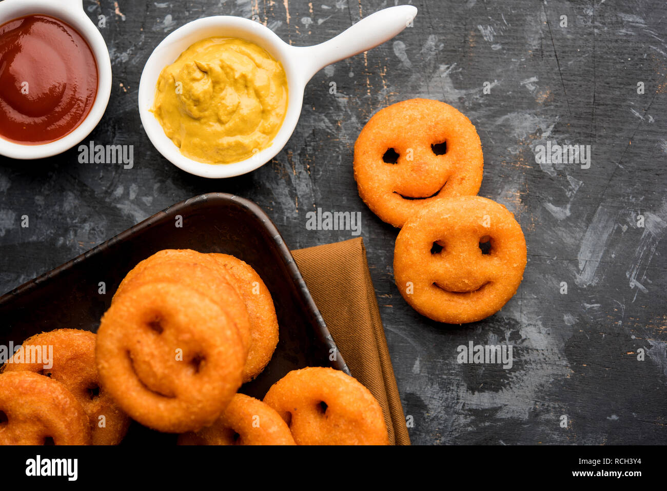 Crunchy potato smiling face snacks hi-res stock photography and images ...
