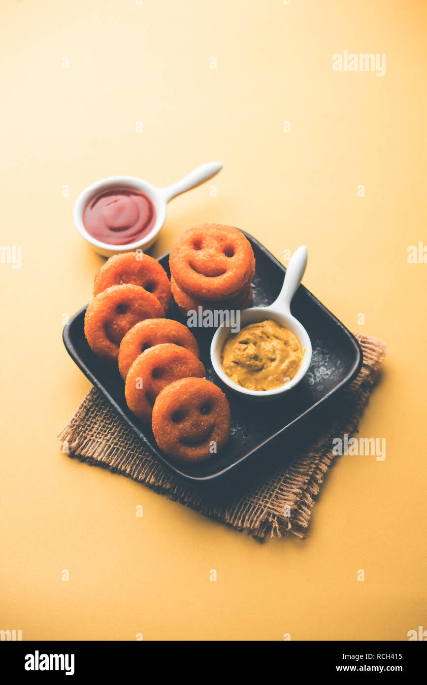 Crunchy potato smiling face snacks hi-res stock photography and images ...