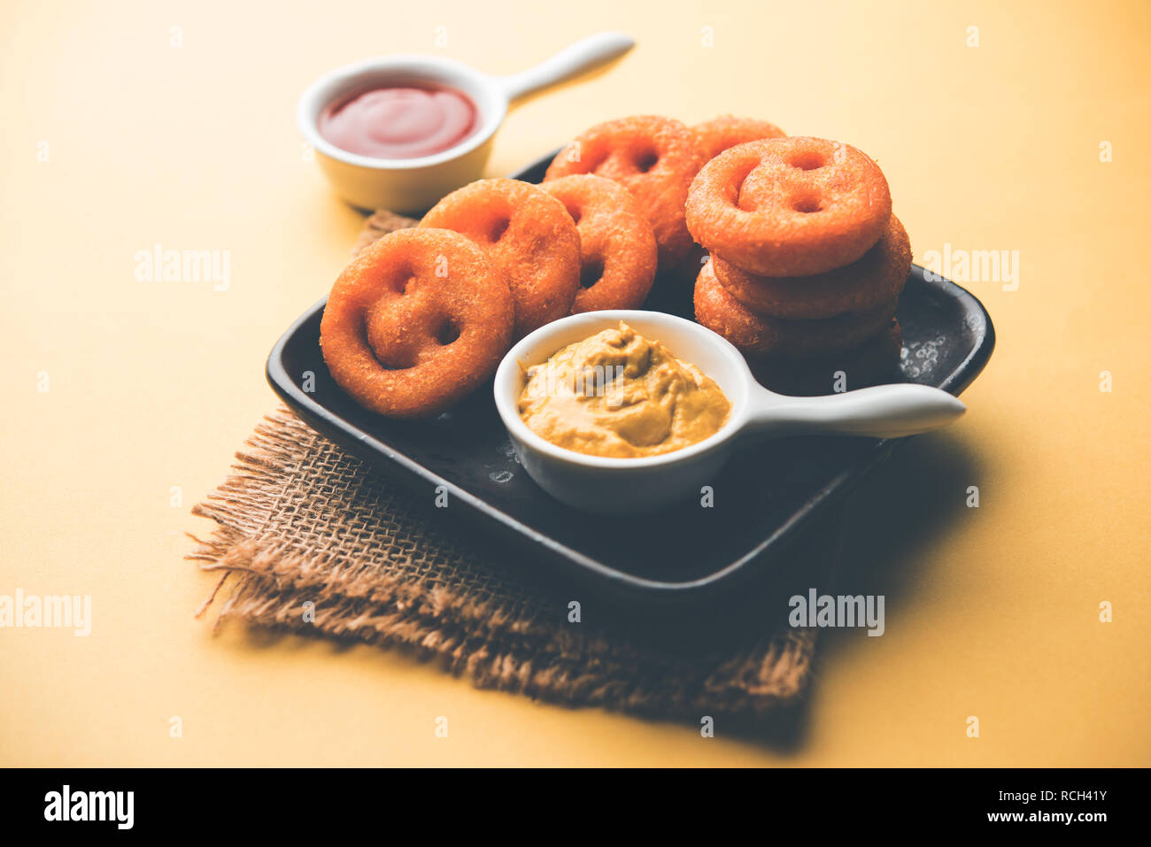 Crunchy potato smiling face snacks hi-res stock photography and images ...
