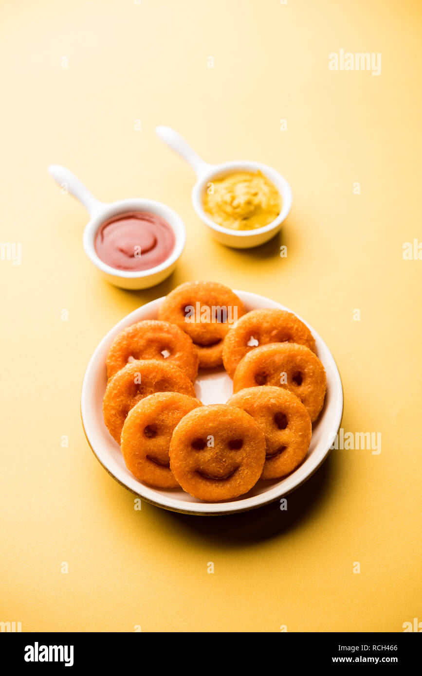 Crunchy potato smiling face snacks hi-res stock photography and images ...