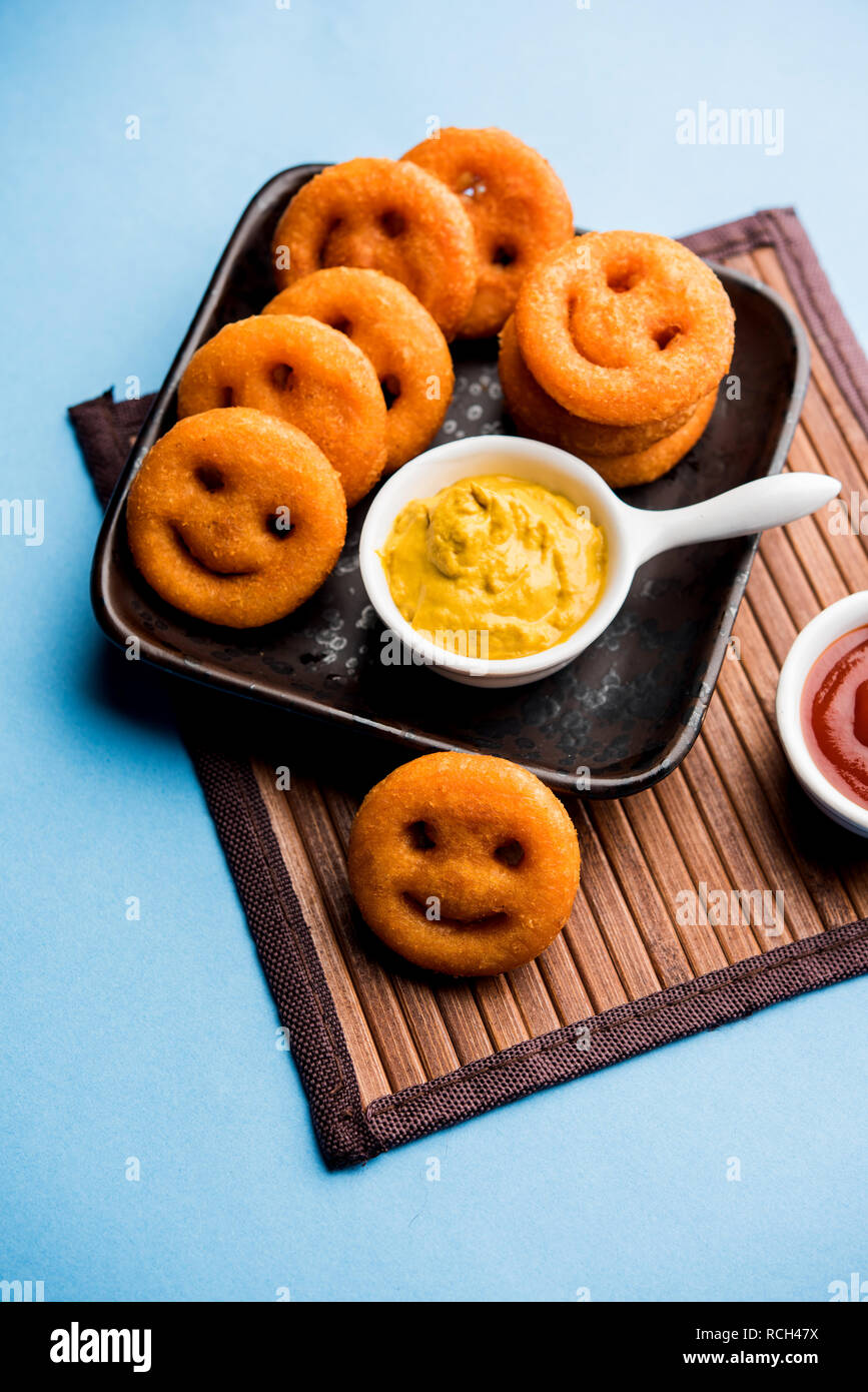 Crunchy potato smiling face snacks hi-res stock photography and images ...