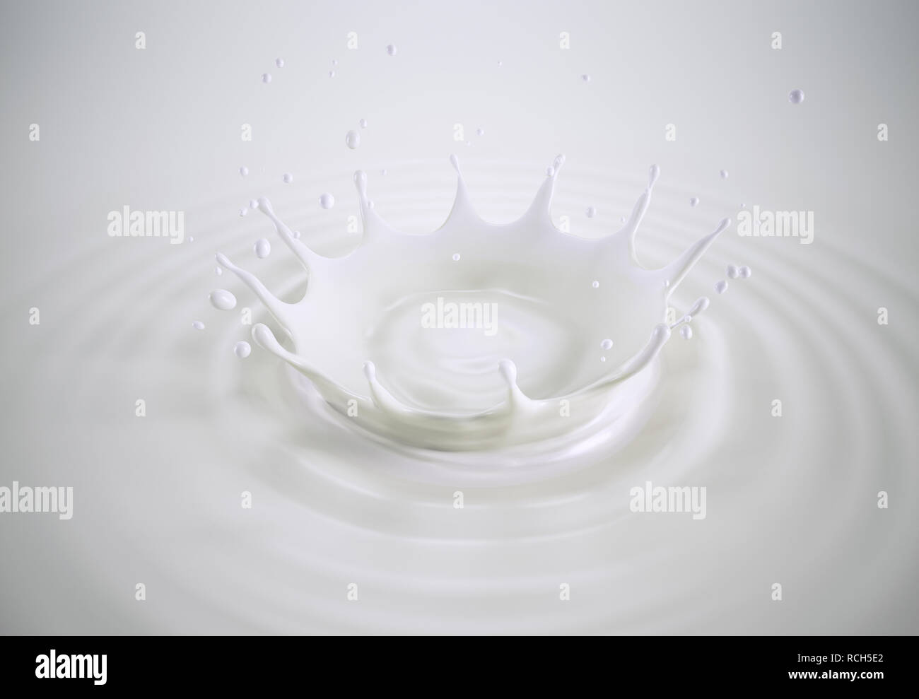 Milk crown splash, splashing in milk pool with ripples. Bird eye view ...
