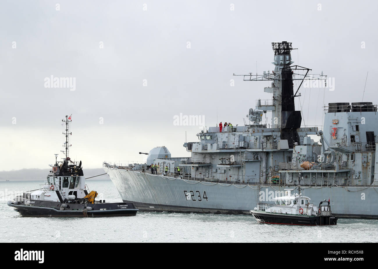 HMS Iron Duke, a Royal Navy Type-23 frigate, is towed out of Portsmouth ...