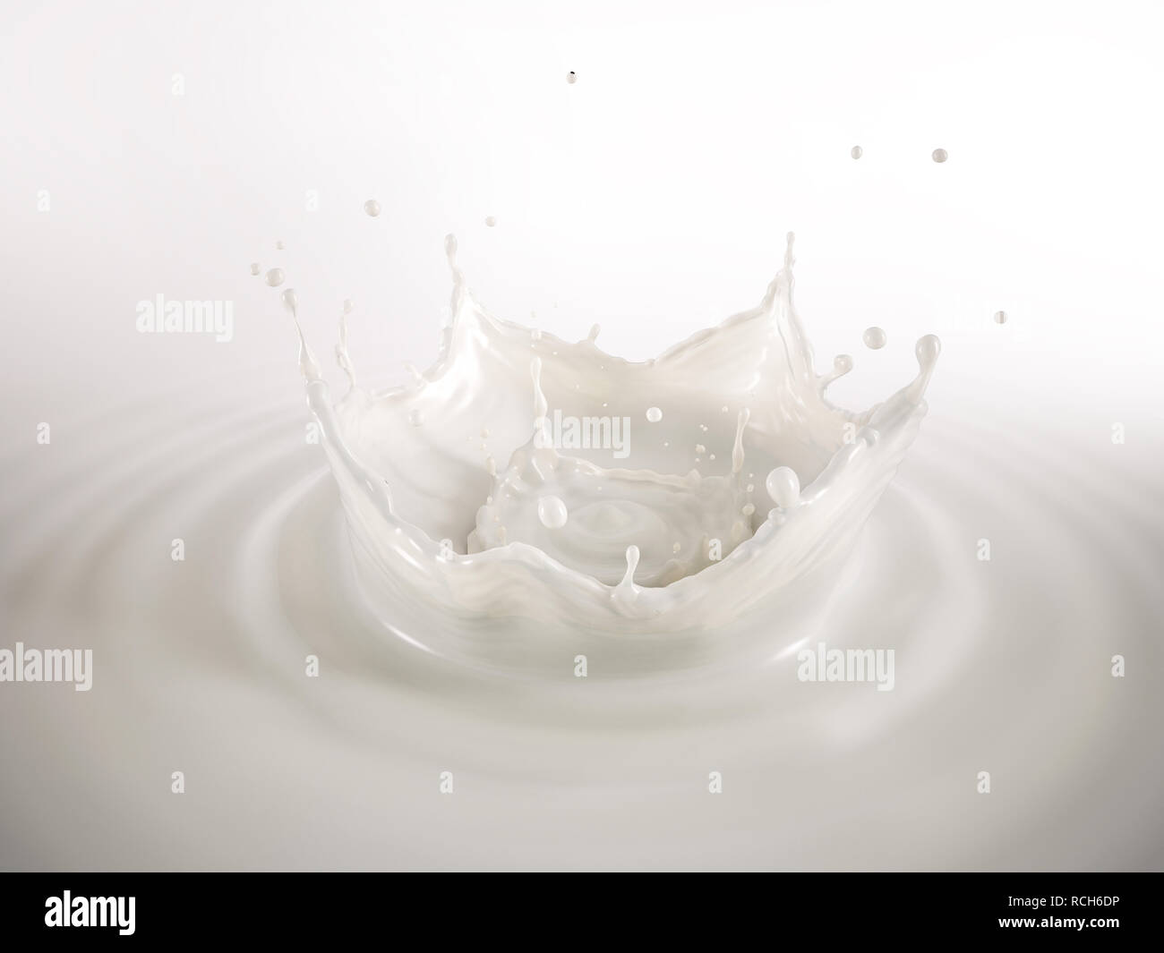 Milk double crown splash, splashing in milk pool with ripples. Bird eye ...