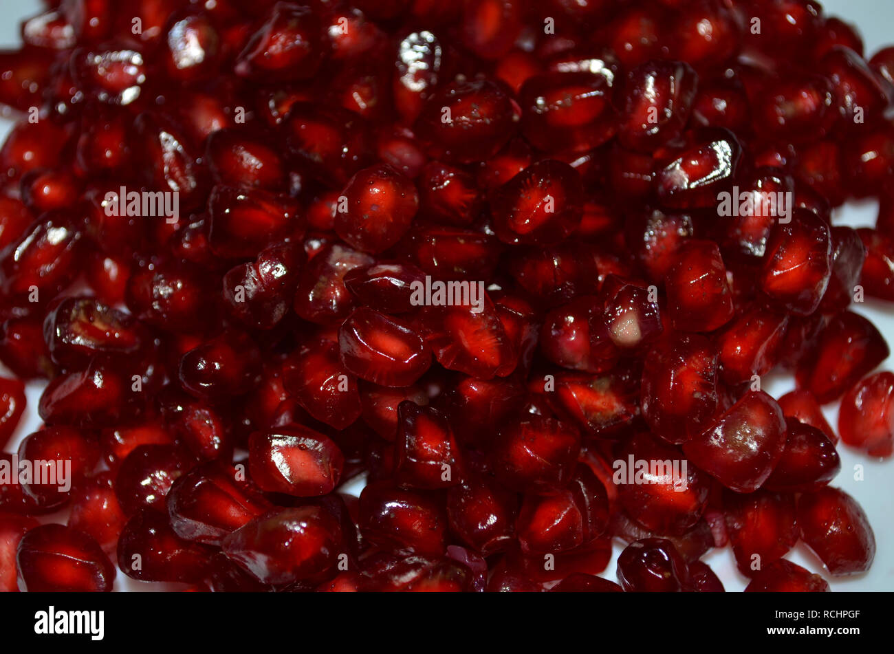 Organic Fresh Red Pomegranate Seeds Stock Photo - Alamy