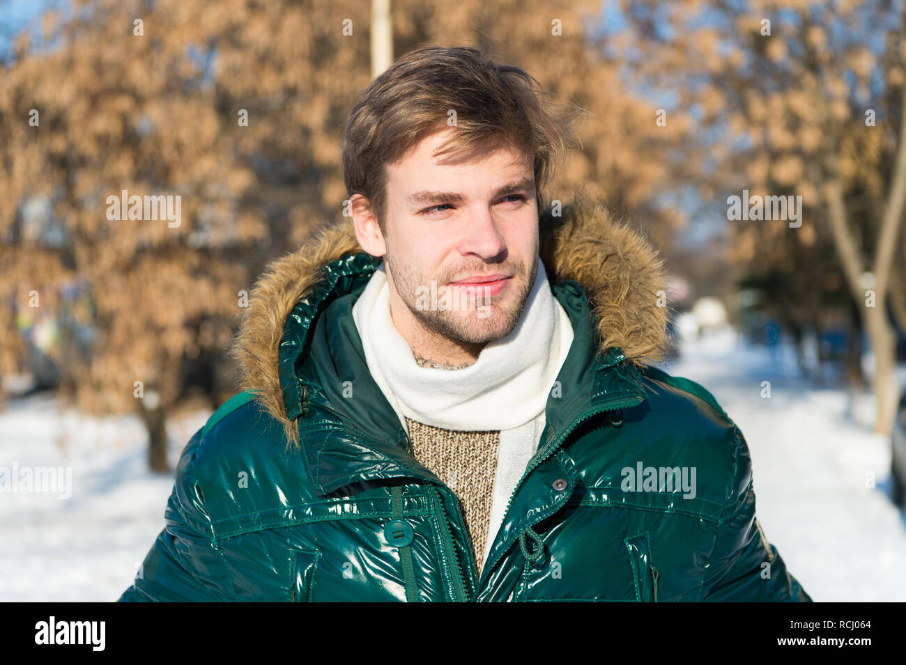 man on winter holidays. Vacation and traveling. Man. It is cold outside ...