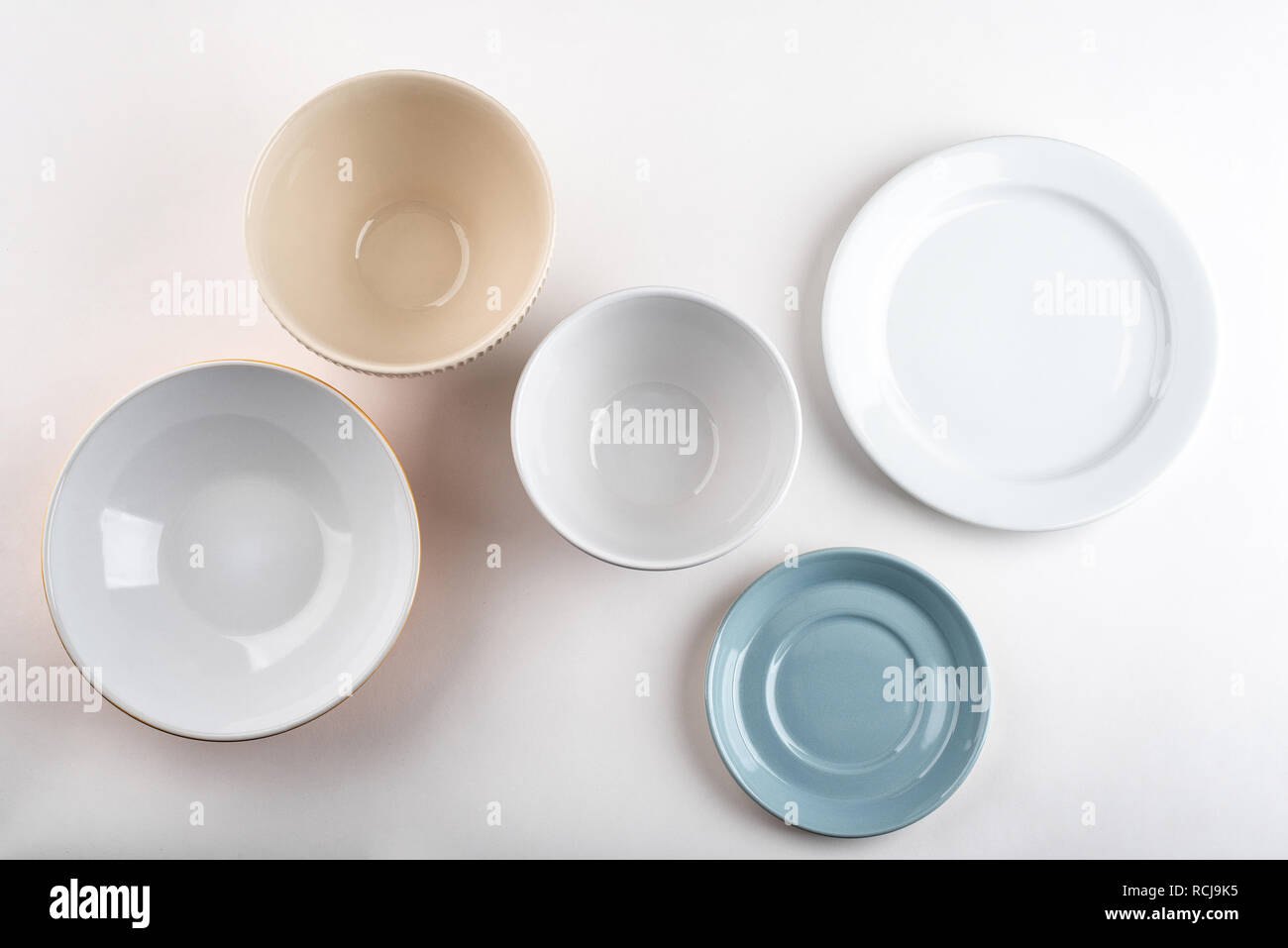 Set of different plates Stock Photo - Alamy
