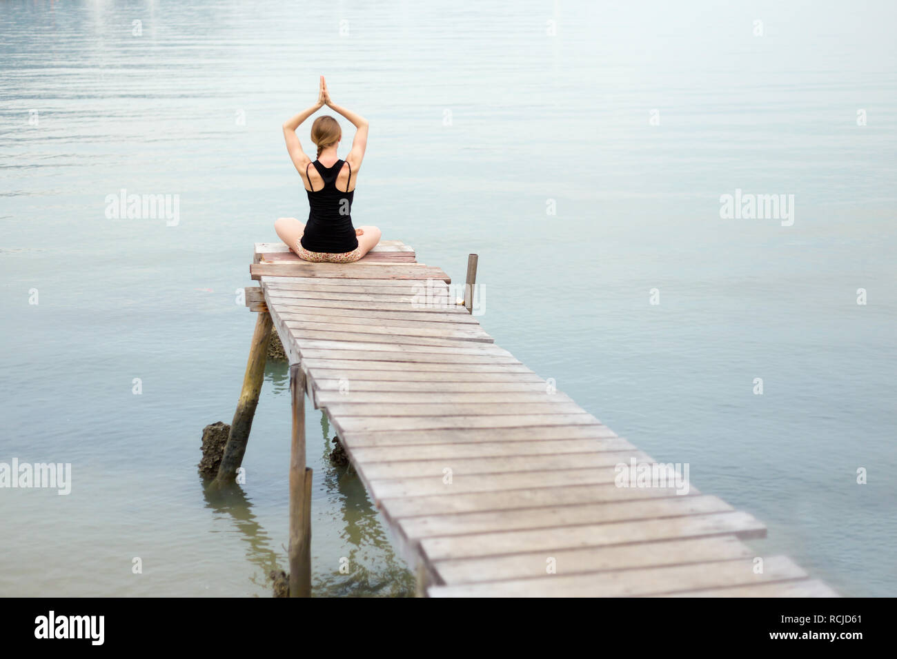Summer yoga session on a pier - Koh Chang Bang Bao fisherman village ...