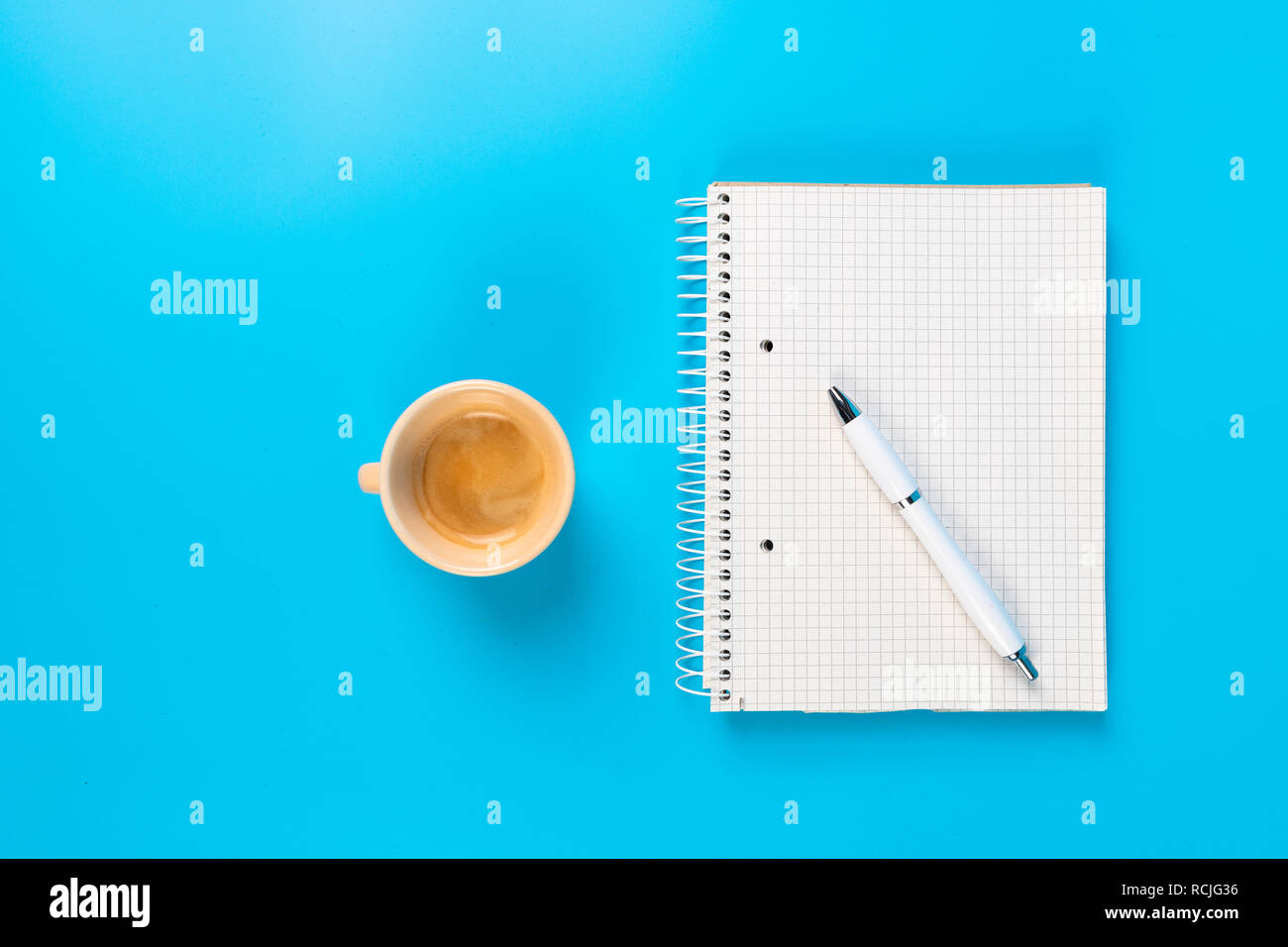 take notes while drinking a coffee Stock Photo - Alamy