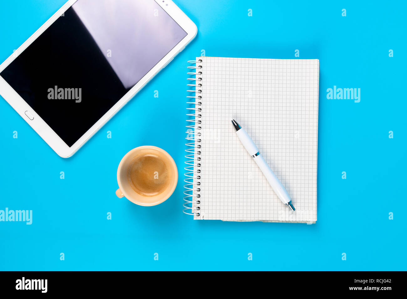 take notes while drinking a coffee Stock Photo - Alamy