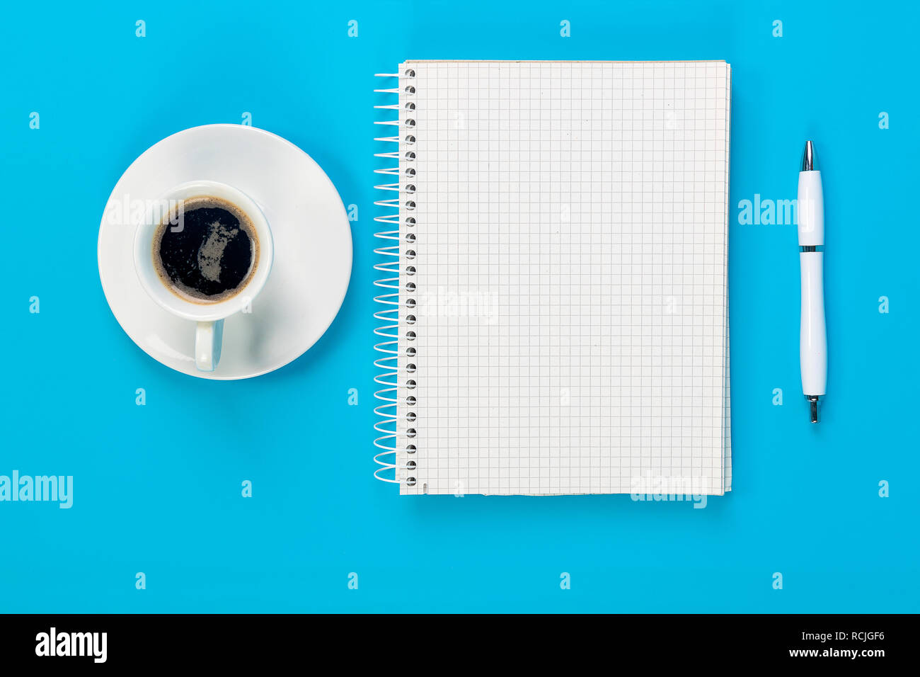 take notes while drinking a coffee Stock Photo - Alamy