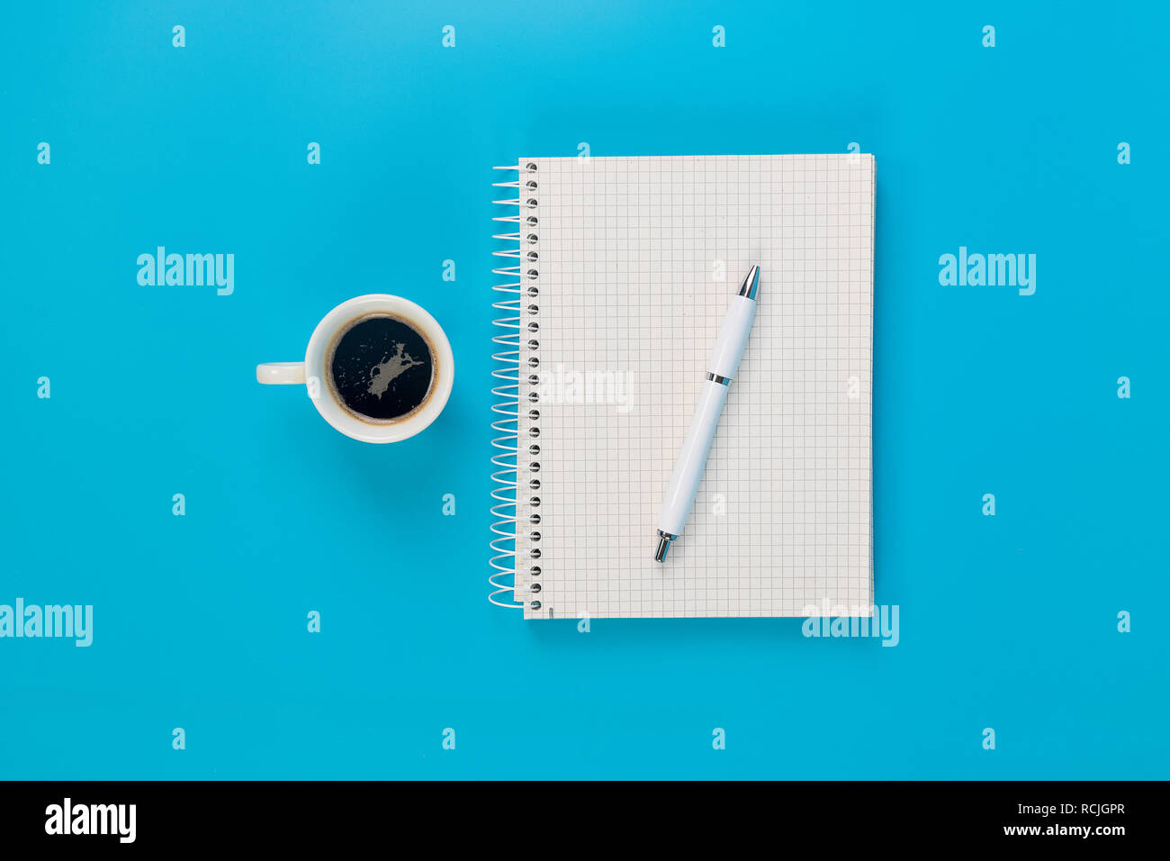 take notes while drinking a coffee Stock Photo - Alamy