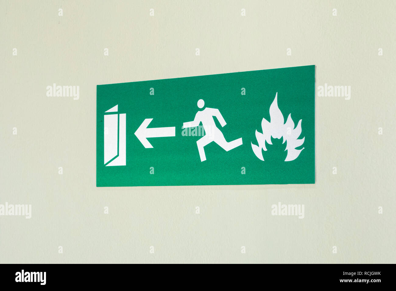 Emergency exit sign Stock Photo - Alamy