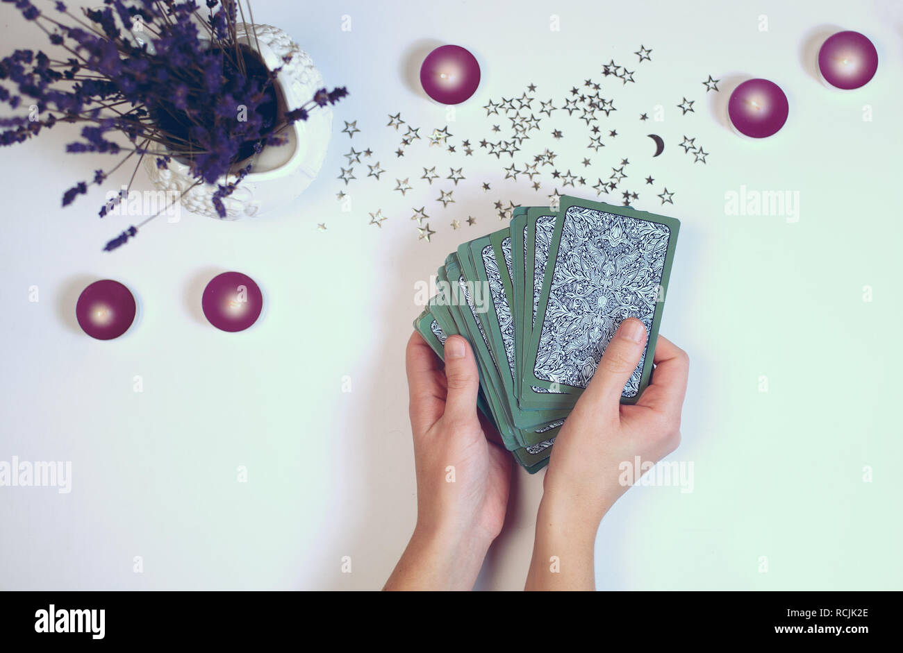 Woman reading tarot cards hi-res stock photography and images - Alamy