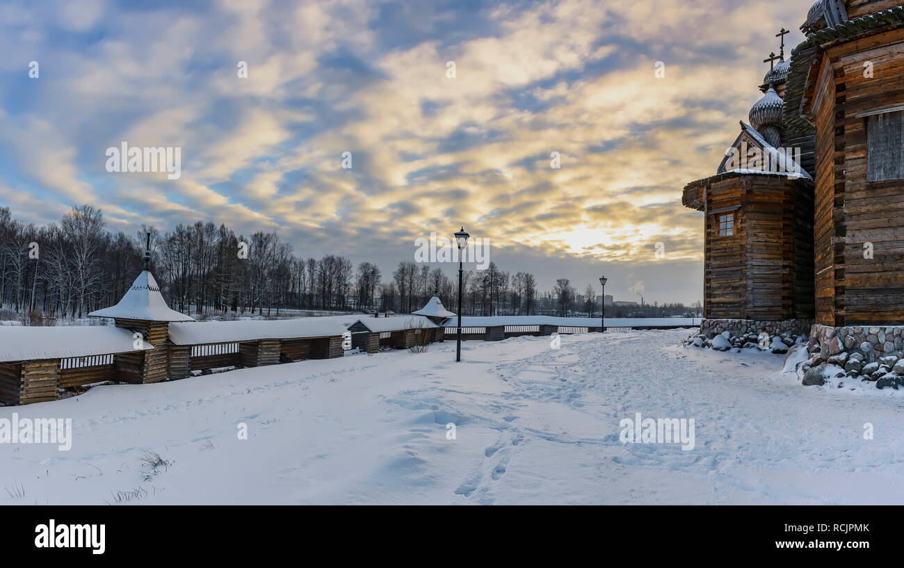 Winter day in the forest Park. Wooden Pokrovsky Cathedral, a monument ...