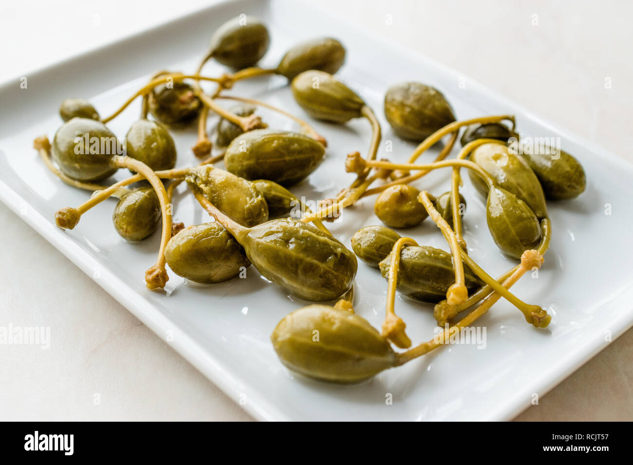 Pickled and Canned Capers Ready to Eat in Plate. Organic Food Stock ...