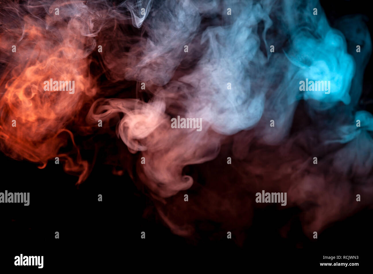 Clear, isolated streams of dense smoke, screwed against a black ...