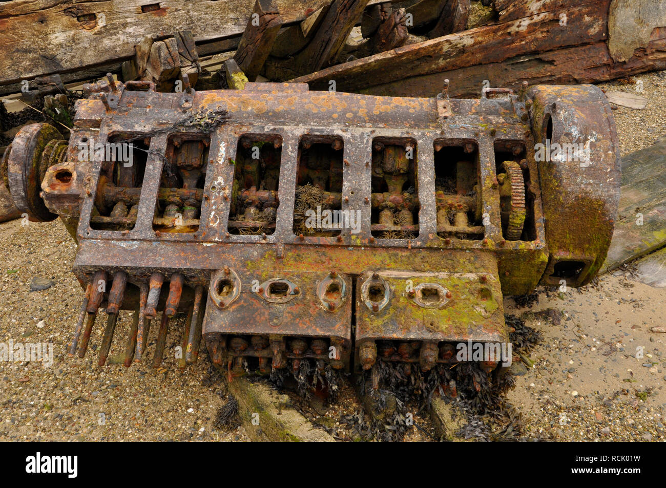 Rusty boat's engine among wreckage on the foreshore in Cornwall.UK ...