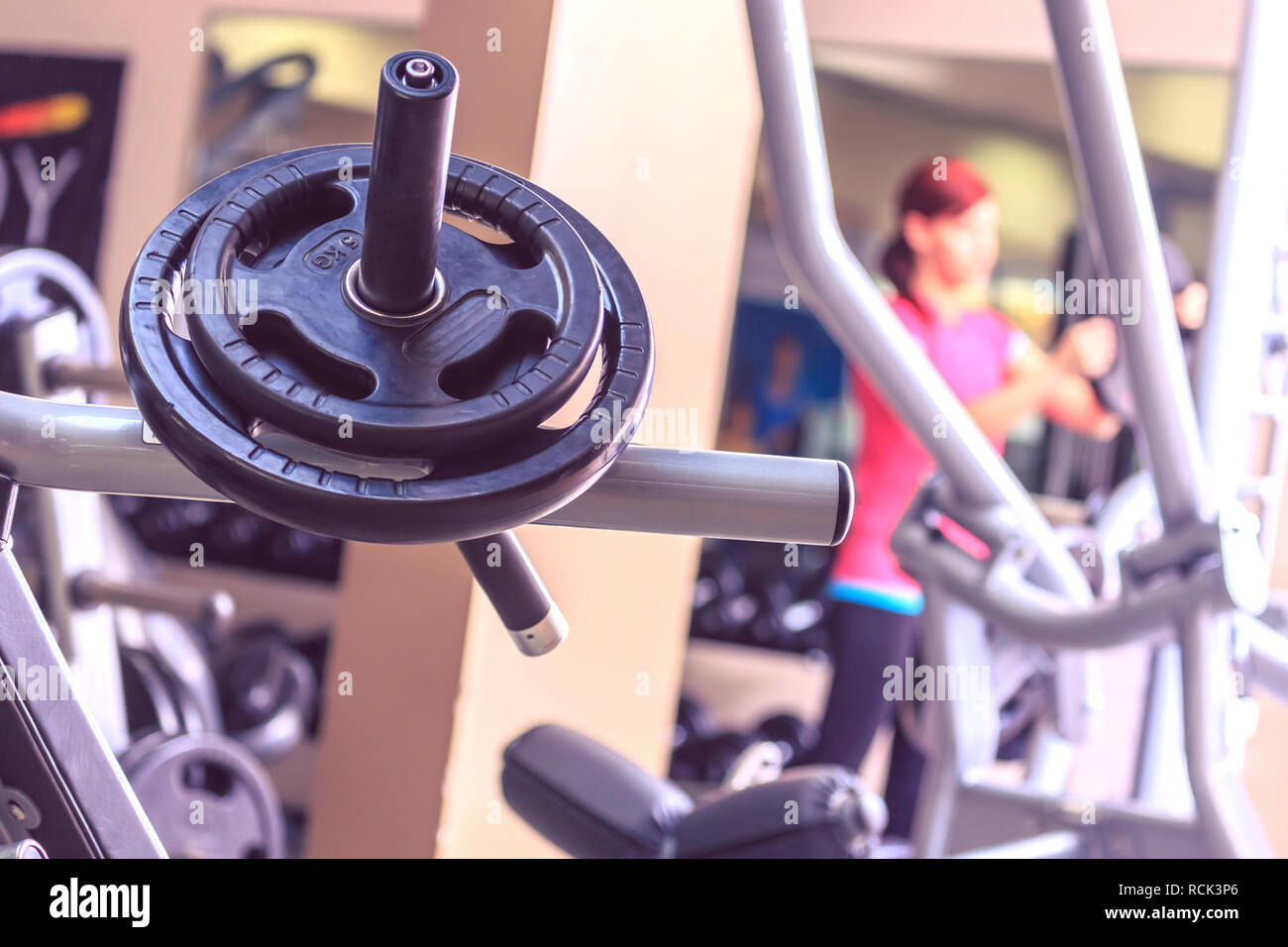 diverse equipment and machines at the gym room Stock Photo - Alamy