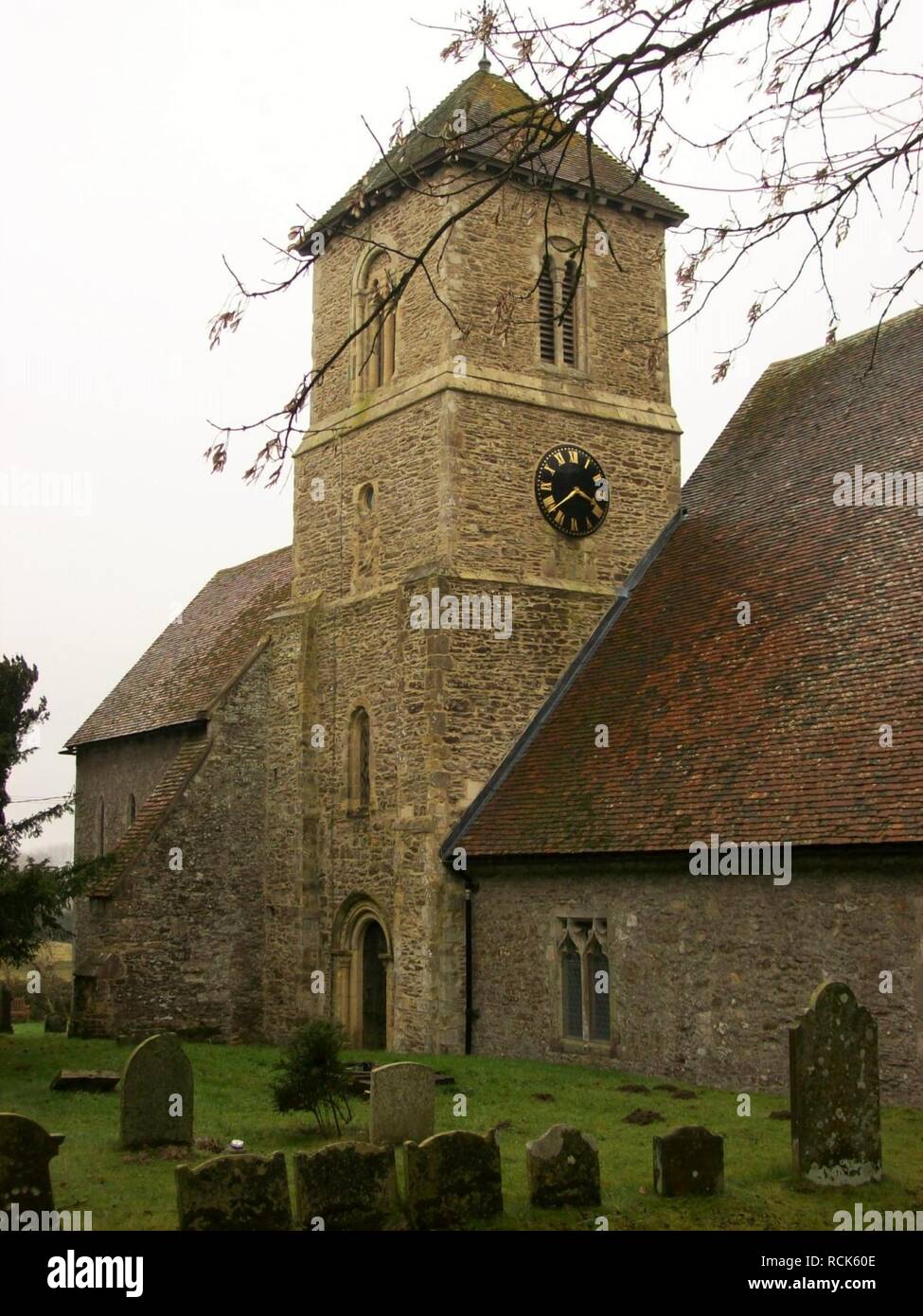 All Saints, Icklesham, the tower Stock Photo - Alamy