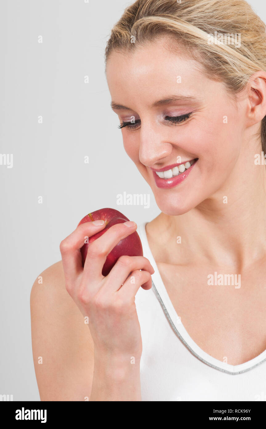 Woman white vest fruit hi-res stock photography and images - Alamy