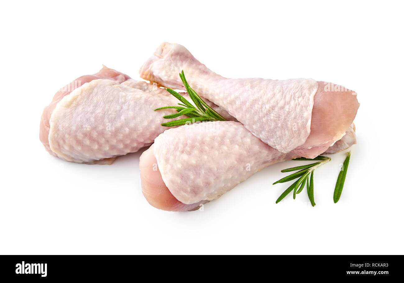 Raw chicken legs with rosemary isolated on white background Stock Photo ...