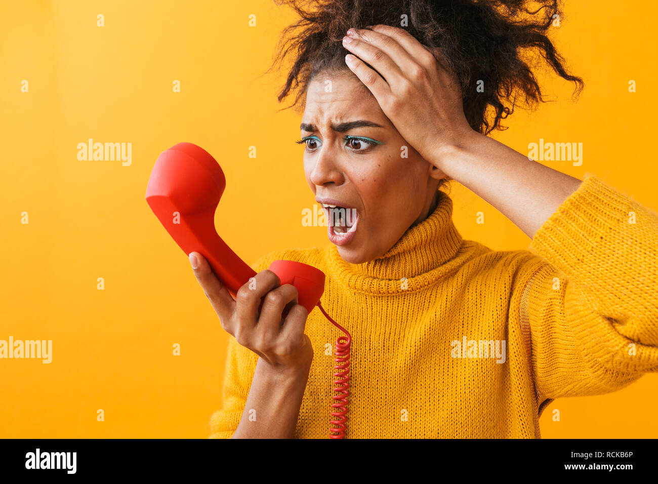 Portrait of brunette african american woman with afro hairstyle ...