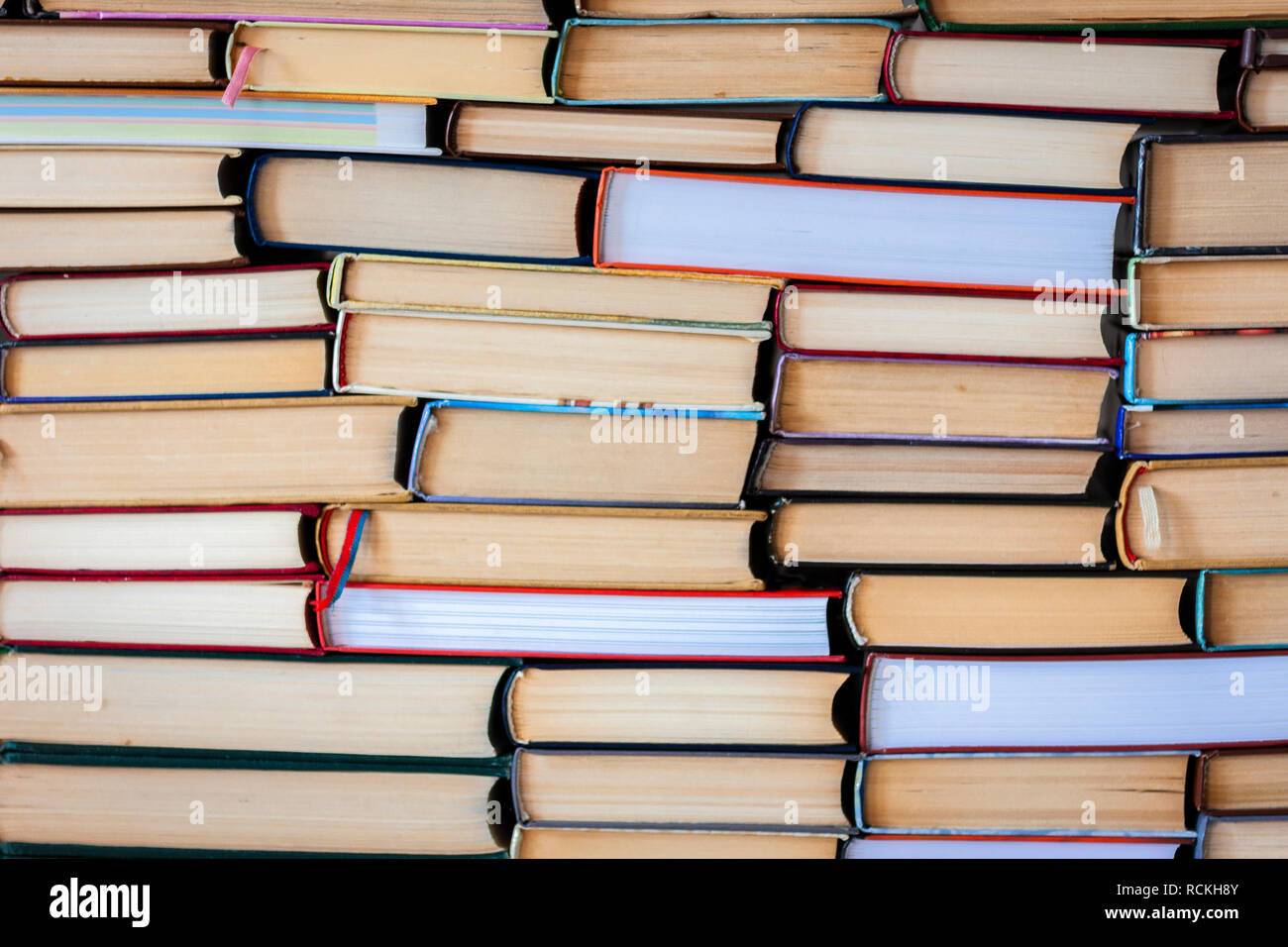 Stack of books education concept background, many books piles Stock ...