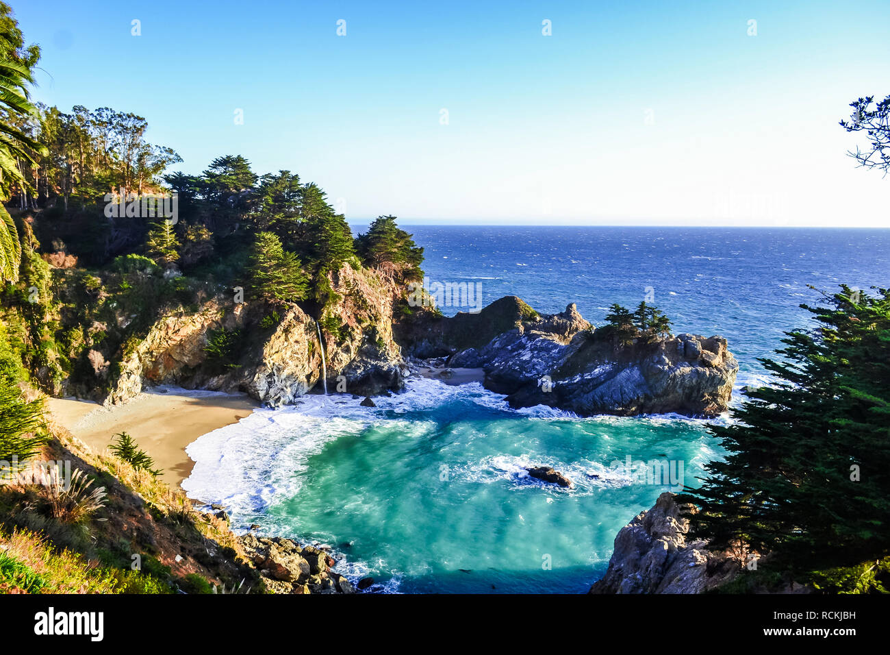 Ocean coast, small waterfall Stock Photo - Alamy
