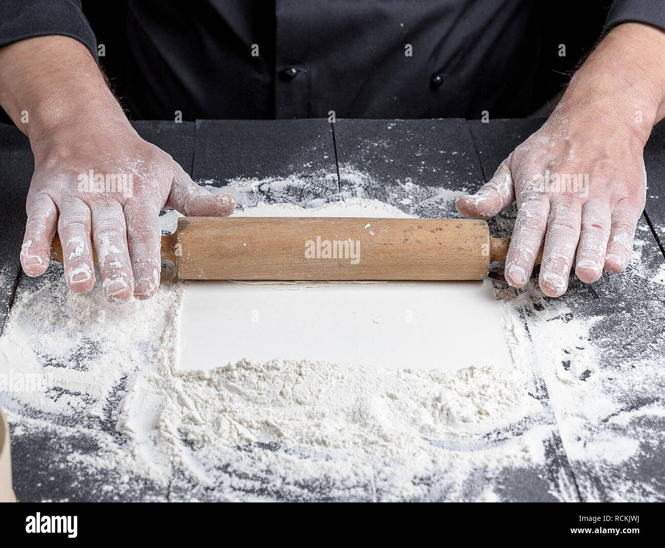 Closeup hands man rolling pin hi-res stock photography and images - Alamy