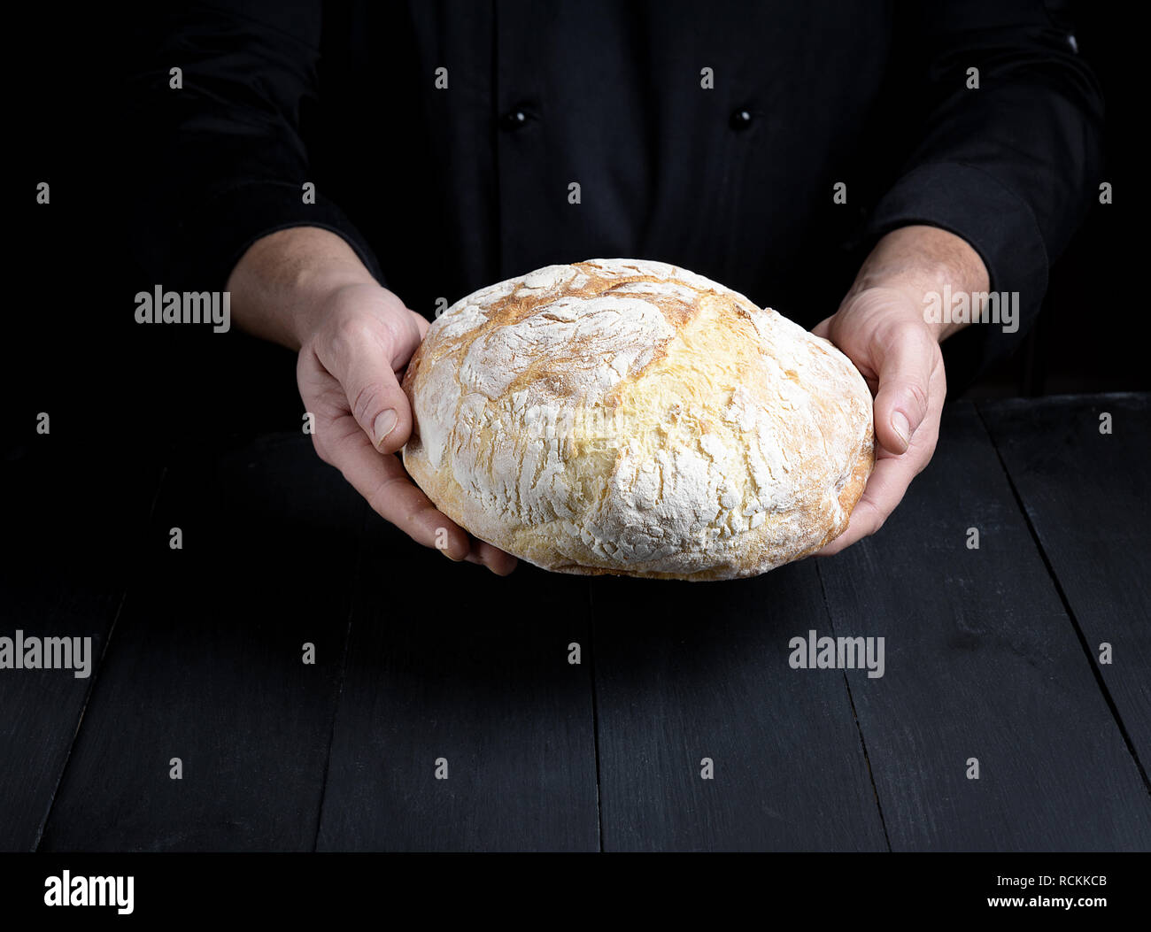 Black male with a loaf of bread hi-res stock photography and images - Alamy