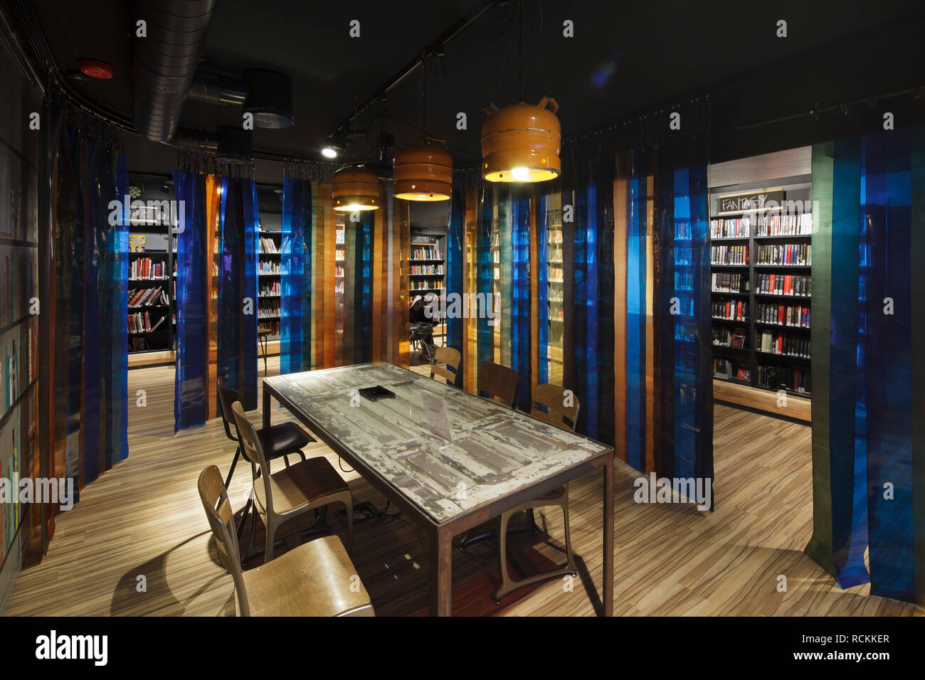 Study room in basement reading room with wooden flooring and blue and ...