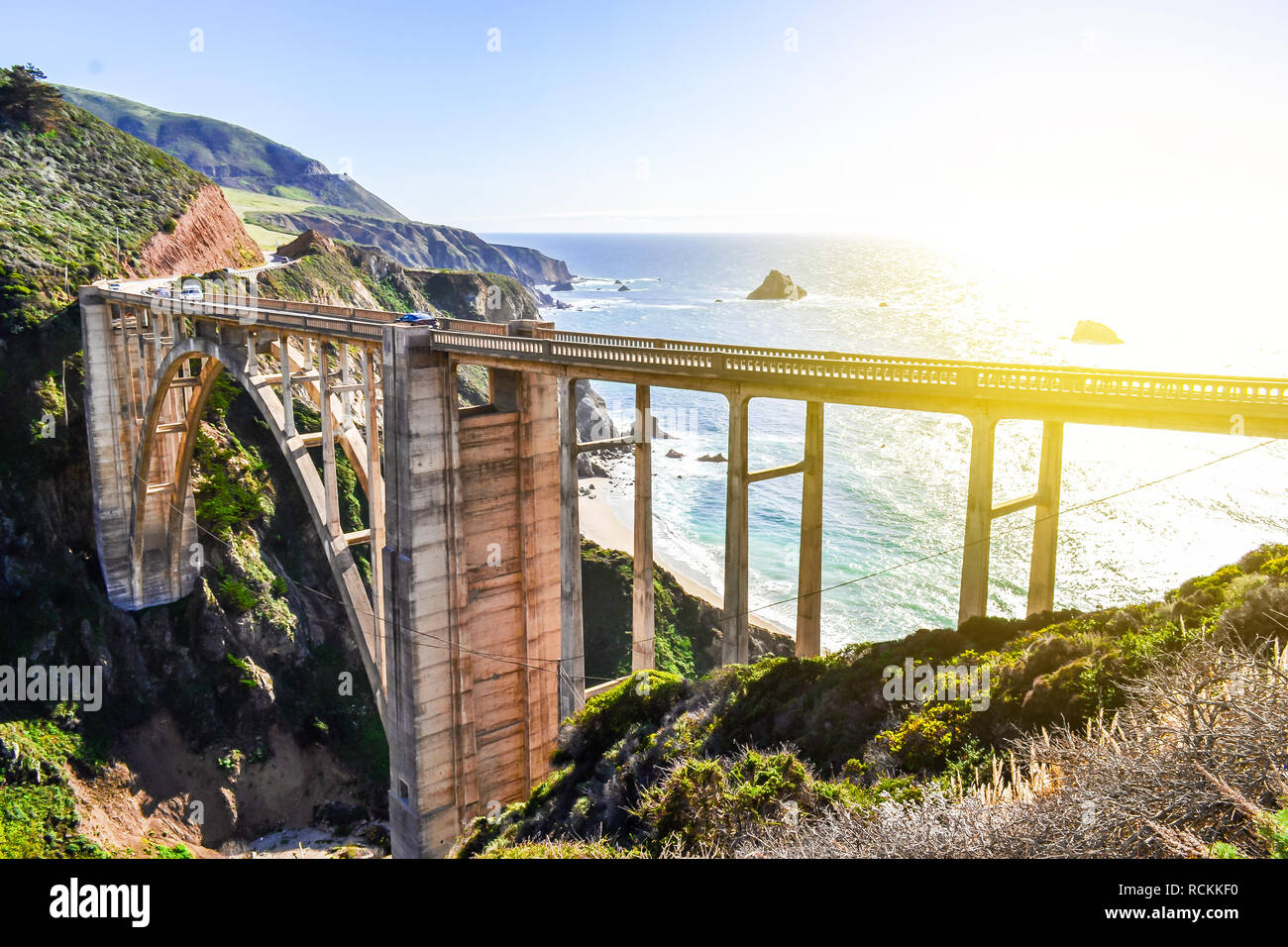Bridge between rocks on the sea coast Stock Photo - Alamy
