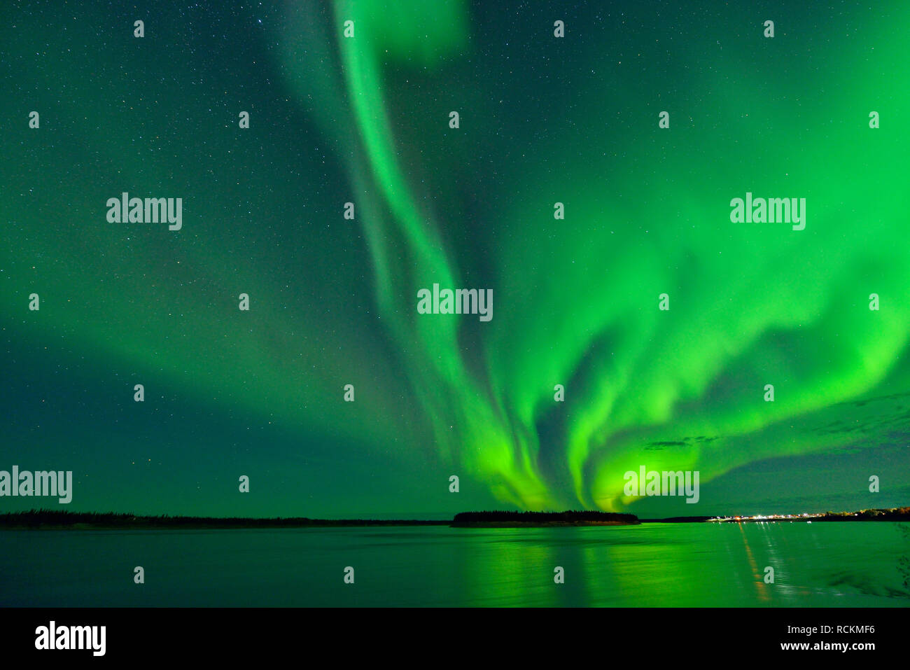 Aurora borealis (northern lights) over the Mackenzie River with Fort ...