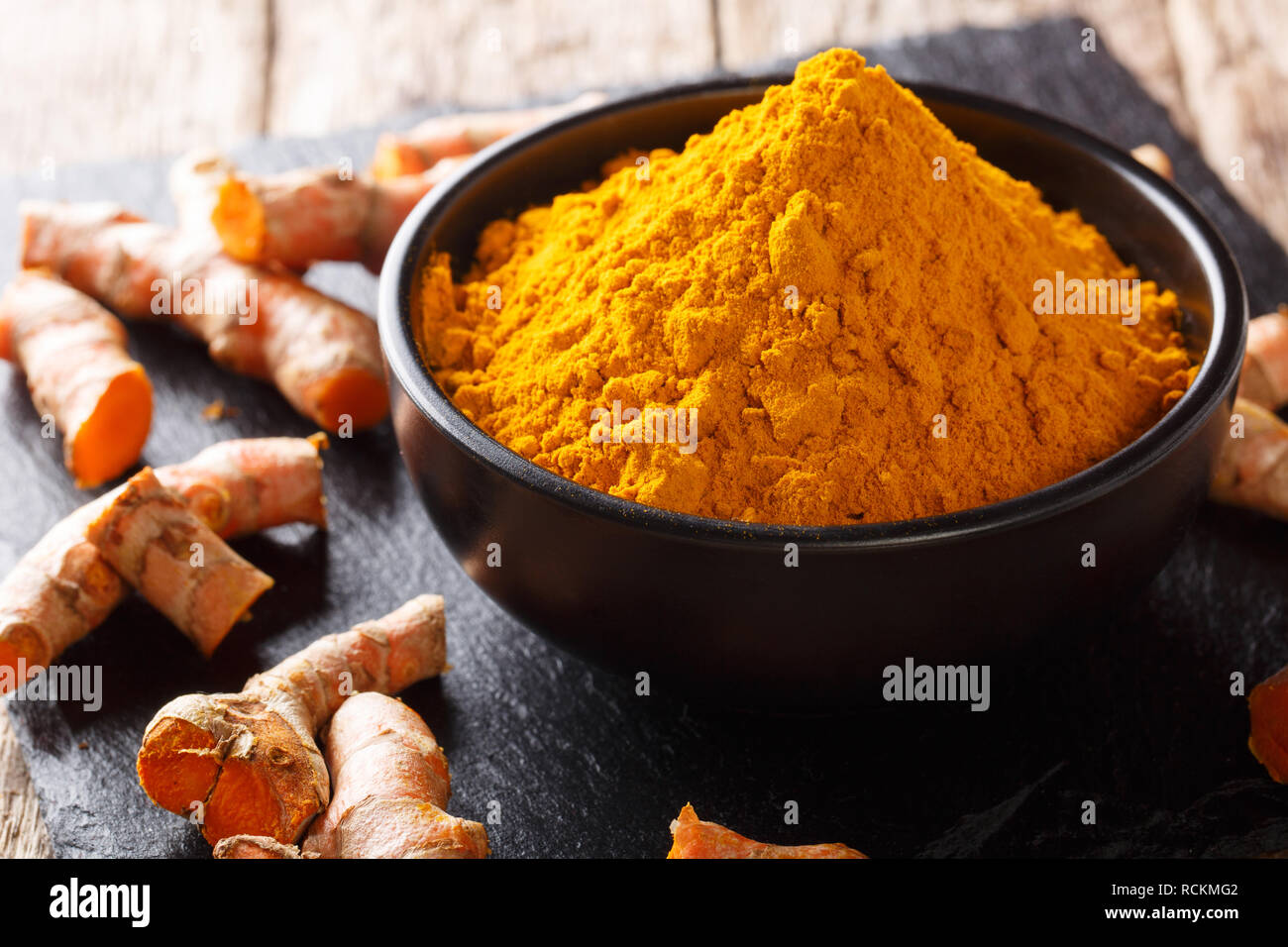 Turmeric root and powder hi-res stock photography and images - Alamy