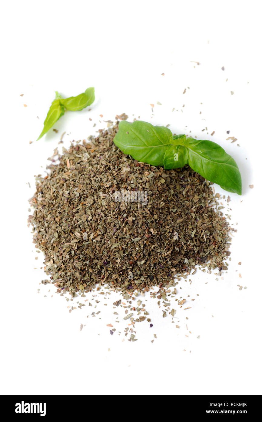Fresh organic basil and ground basil isolated on white background Stock ...