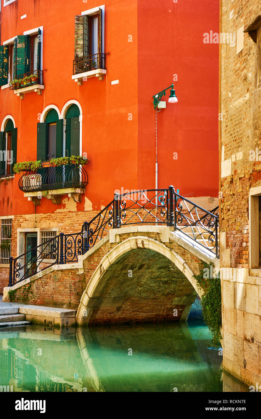 Small arch bridge over canal in Venice, Italy Stock Photo - Alamy