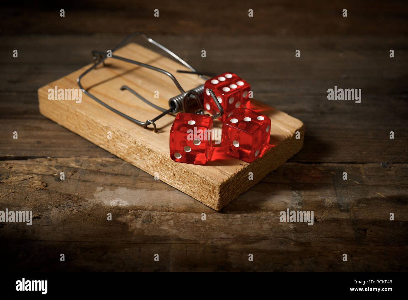 Red dice mousetrap gambling trap hi-res stock photography and images ...
