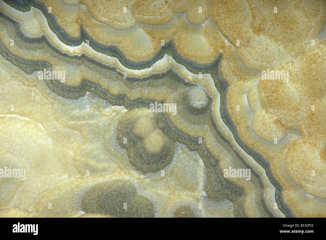 A beautiful background of natural stone, called onix naranja veteado ...
