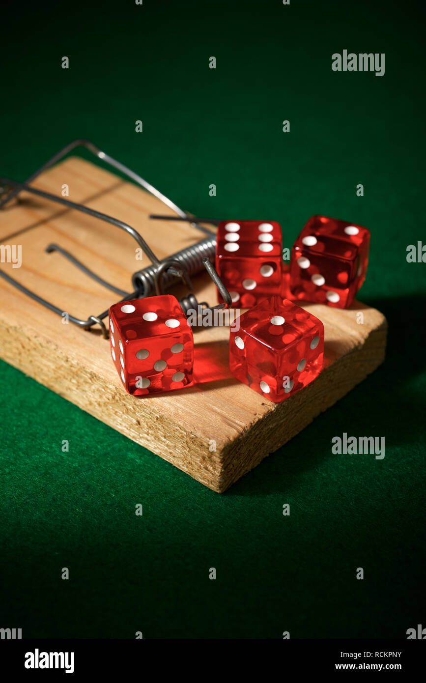 Red dice mousetrap gambling trap hi-res stock photography and images ...