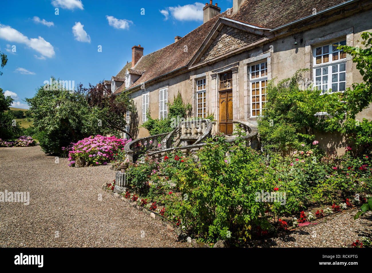 Medieval French Mansion with sweeping circular steps to front door in ...