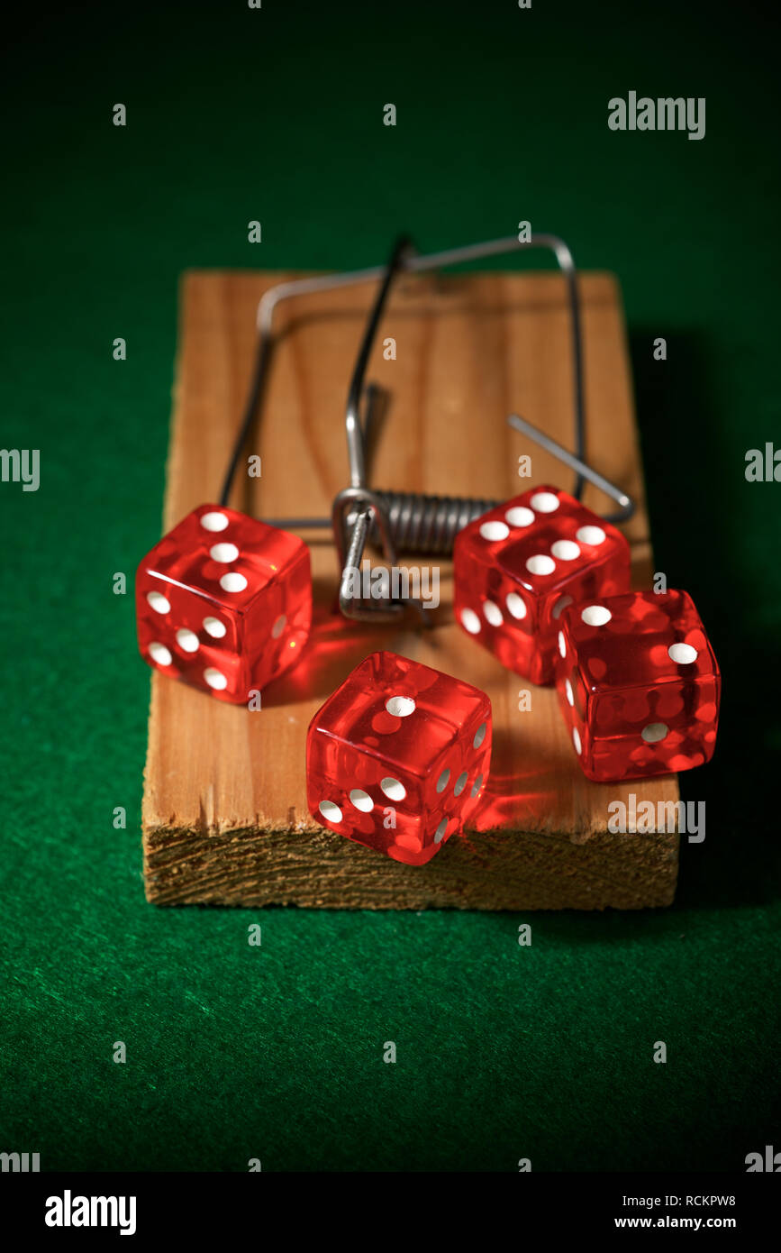 Red dice mousetrap gambling trap hi-res stock photography and images ...