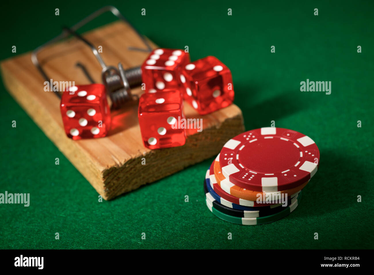 Red dice mousetrap gambling trap hi-res stock photography and images ...