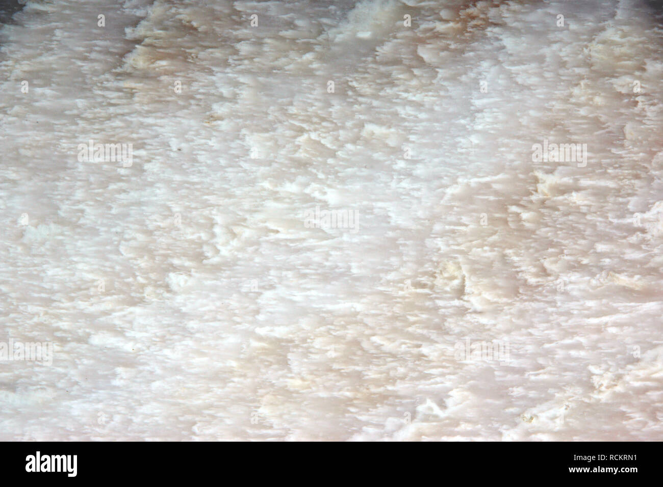 Natural stone Rosa Egeo with waves and white pattern Stock Photo - Alamy