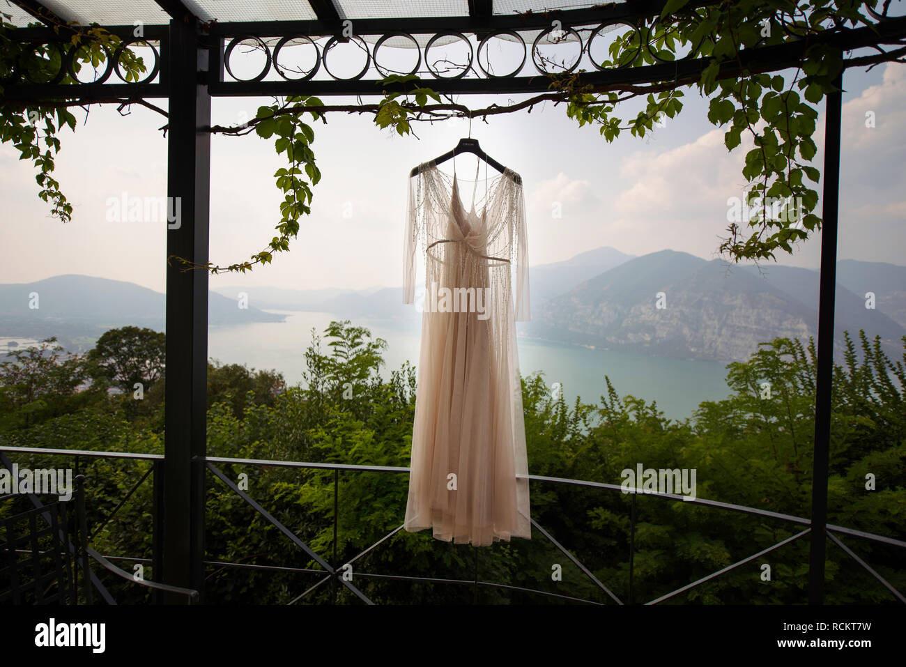 Wedding dress hanging in tree hi-res stock photography and images - Alamy